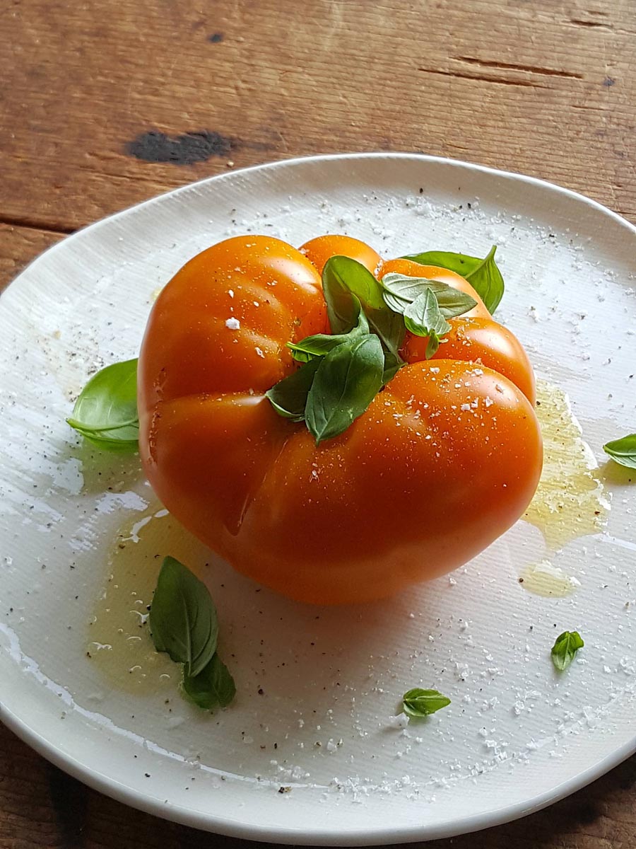 Tomato for one – one perfect tomato for dinner. Solo dining perfection!